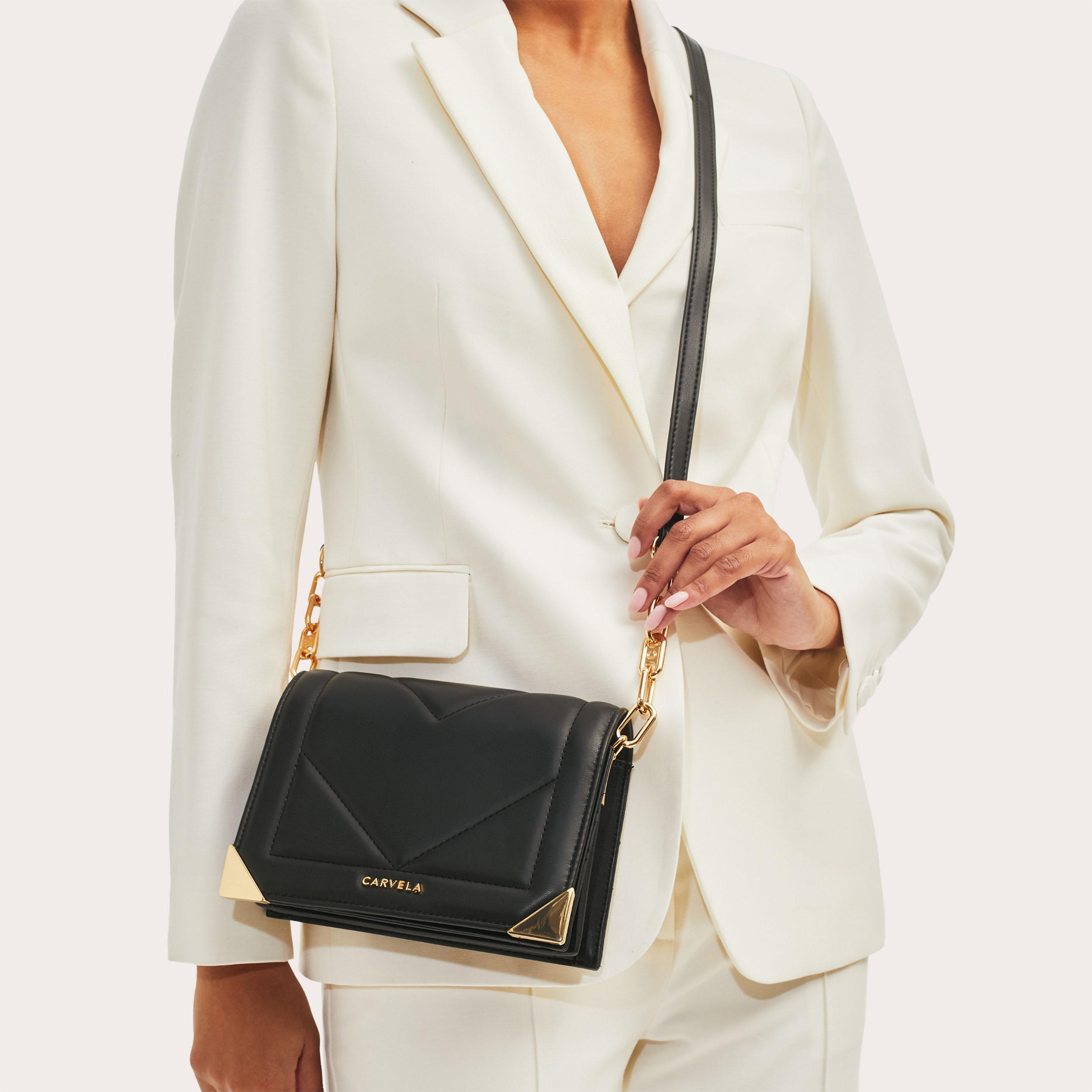 NICKY CROSS BODY Black Cross Body Bag by CARVELA