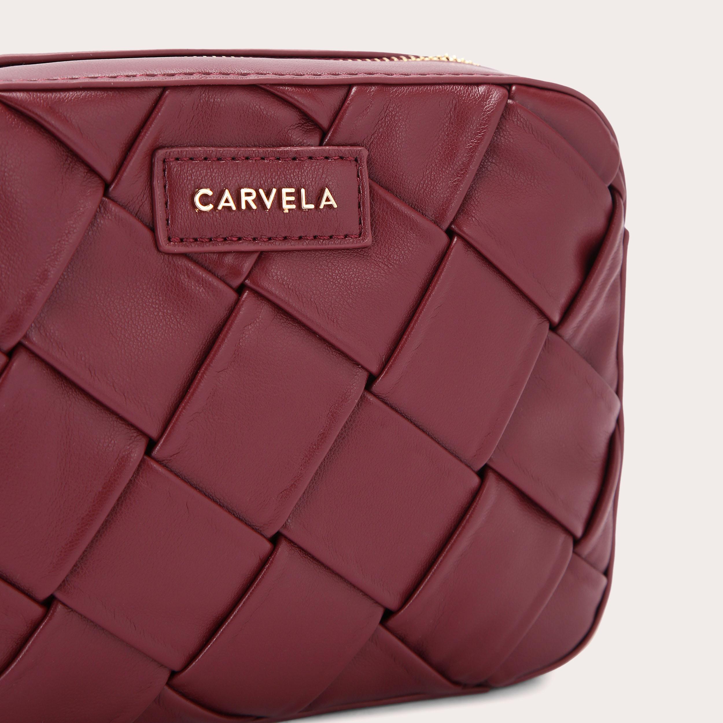 LEXI WEAVE XBODY Wine Cross Body Bag by CARVELA