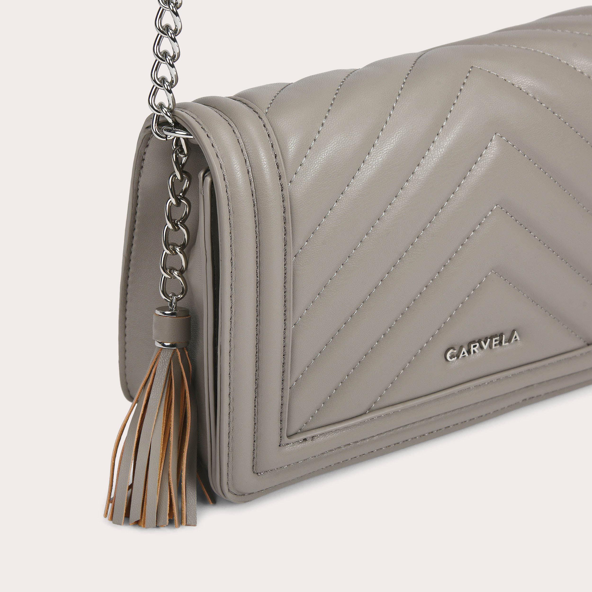 LARA TASSEL FLAPOVER Grey Quilted Cross Body Bag by CARVELA